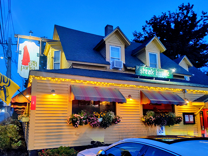 Twinkling lights guide you to steak paradise. Red Parka: where "hitting the slopes" means tackling a mountain of delicious food.