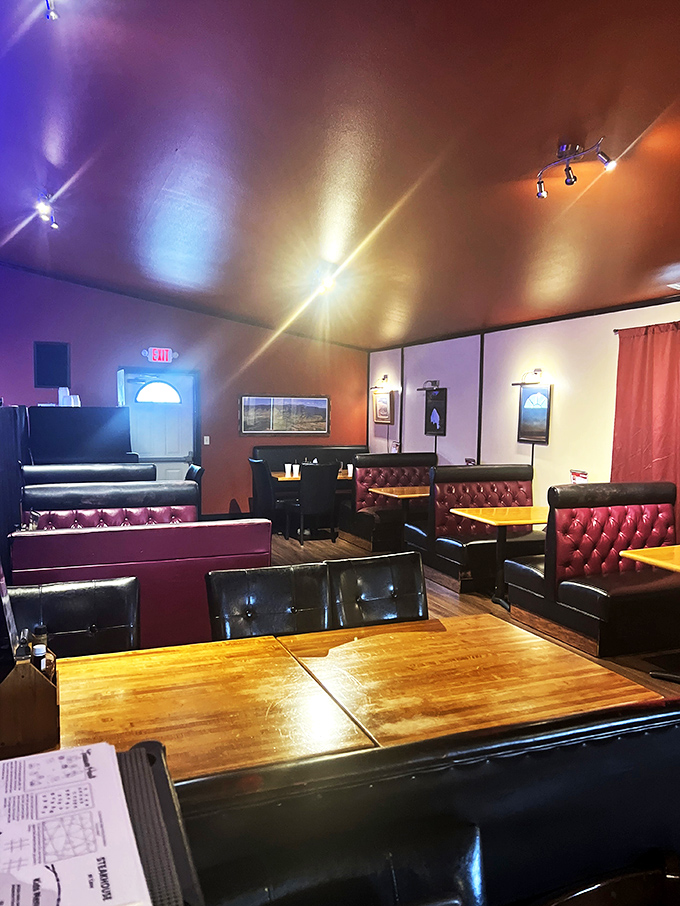 Purple haze of deliciousness! Step into this cozy den where steaks sizzle and conversation flows like gravy.