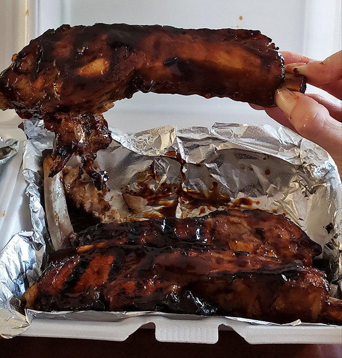 Behold, the carnivore's dream! These ribs aren't just a meal, they're a meaty masterpiece that would make even Fred Flintstone jealous.