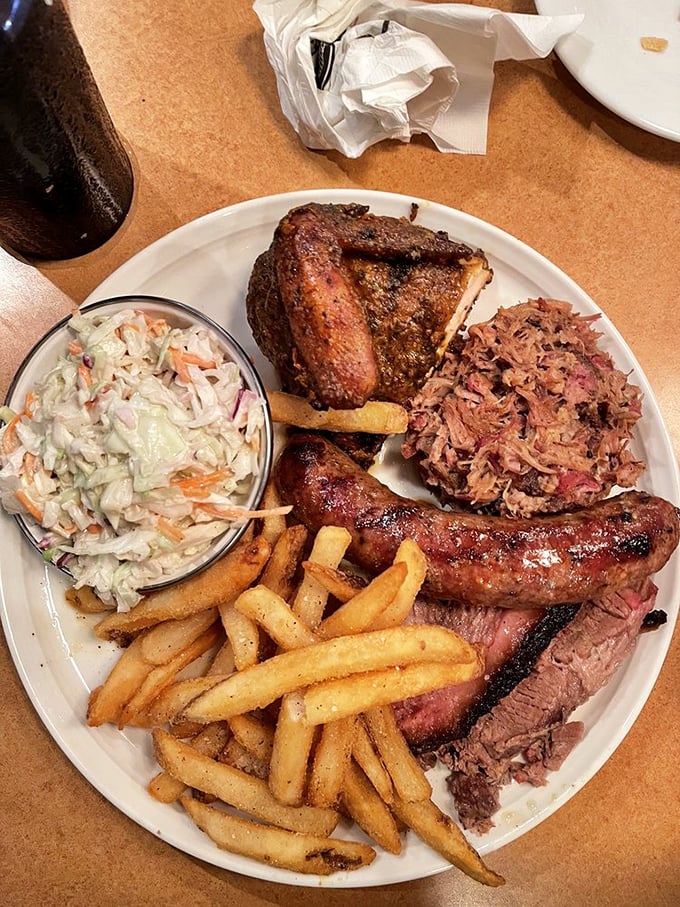 The BBQ sampler plate that answers the eternal question, "Why choose?" with a resounding "You don't have to!" Your shirt may never forgive you.