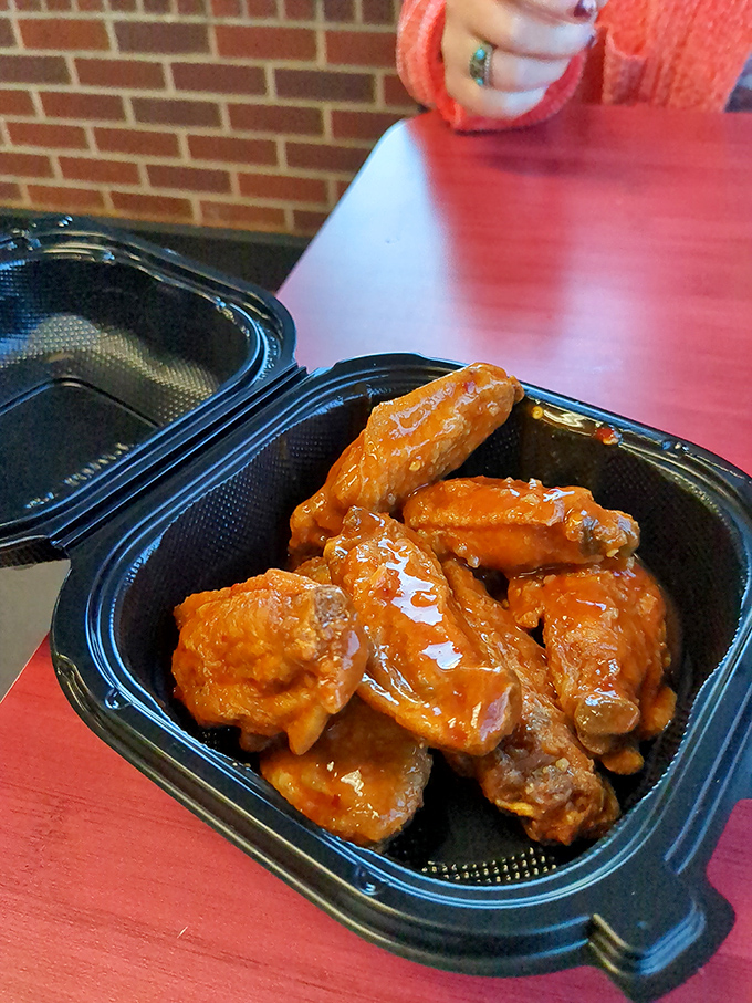 Saucy perfection in a to-go container. These wings are so good, they might just sprout their own and fly away!
