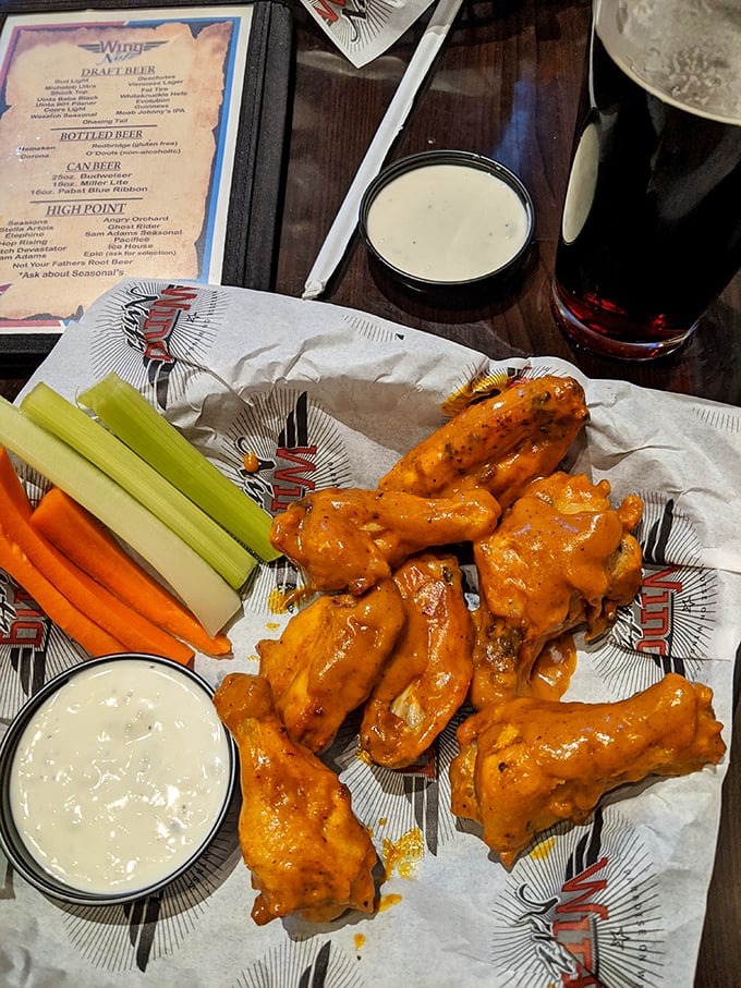 The holy trinity of sports watching: cold beer, hot wings, and the tactile joy of eating with your hands like civilization depends on it.