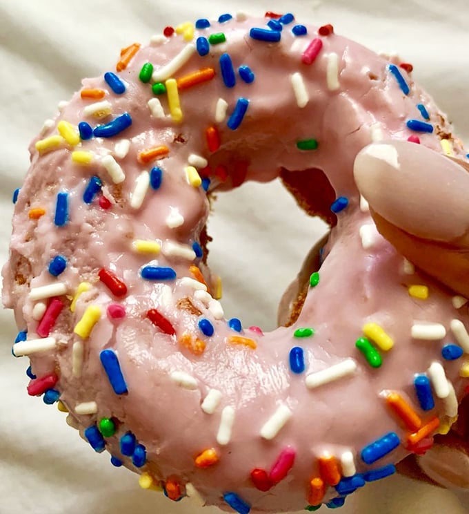 Pretty in pink! This cherry cake donut is dressed to impress, like the belle of the breakfast ball.