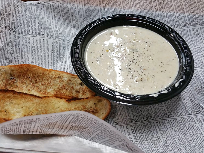 "Clam chowder and toast: the dynamic duo of comfort food. It's like a warm, edible blanket for your taste buds. Dive in and get cozy!"