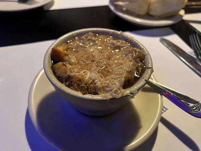 Crouton islands in a sea of savory bliss. This French onion soup is so good, it might just make you forget you're not actually in Paris.