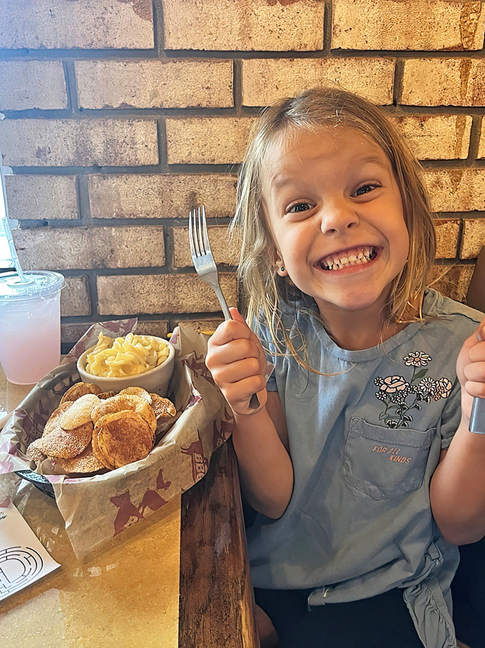 The universal truth of parenting: nothing validates your restaurant choice like a child's face lighting up at first bite of mac and cheese.