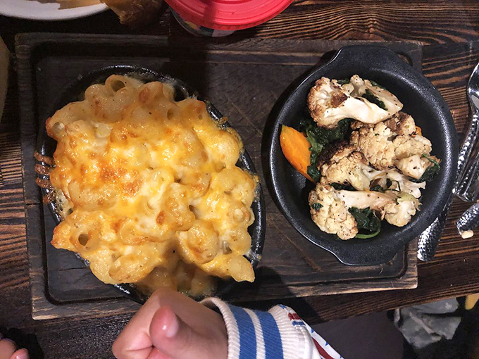 A perfect pairing: gooey mac and cheese meets roasted cauliflower, proving vegetables and comfort food can be soulmates after all.