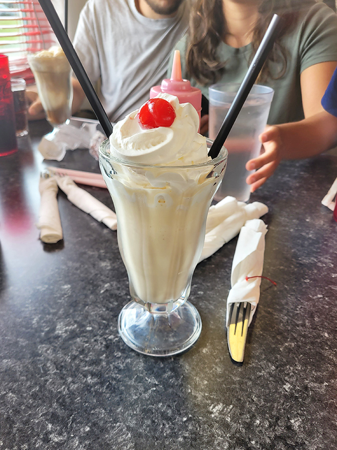 Talk about a tall drink of deliciousness! This milkshake is stacked higher than Elvis's pompadour, and twice as dreamy.