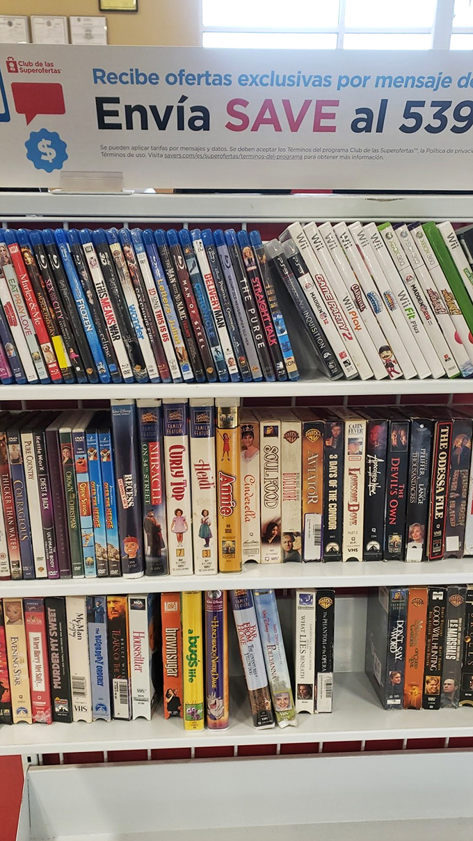A cinephile's dream come true! This shelf is a time machine through Hollywood history, from VHS to Blu-ray.