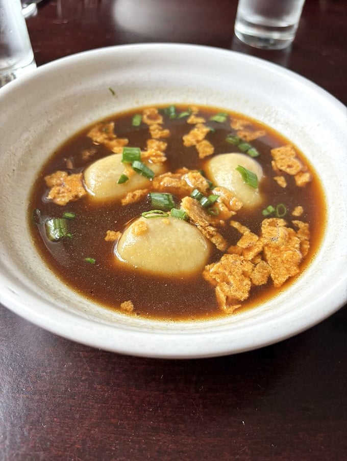 Who knew onion soup could be a work of art? With golden broth, tender pierogies, and a crispy cheese island, it's a masterpiece that belongs in the Louvre of Lunch.