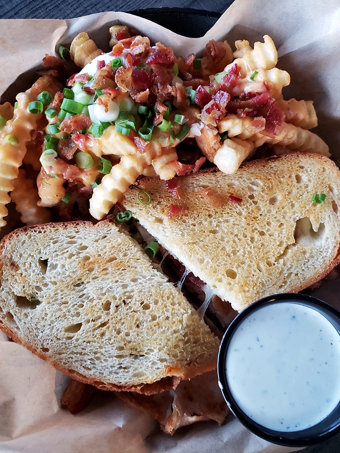Rye oh rye, what a sight for sore eyes! This Reuben's marbled embrace holds secrets of deliciousness that would make Sherlock Holmes drool.