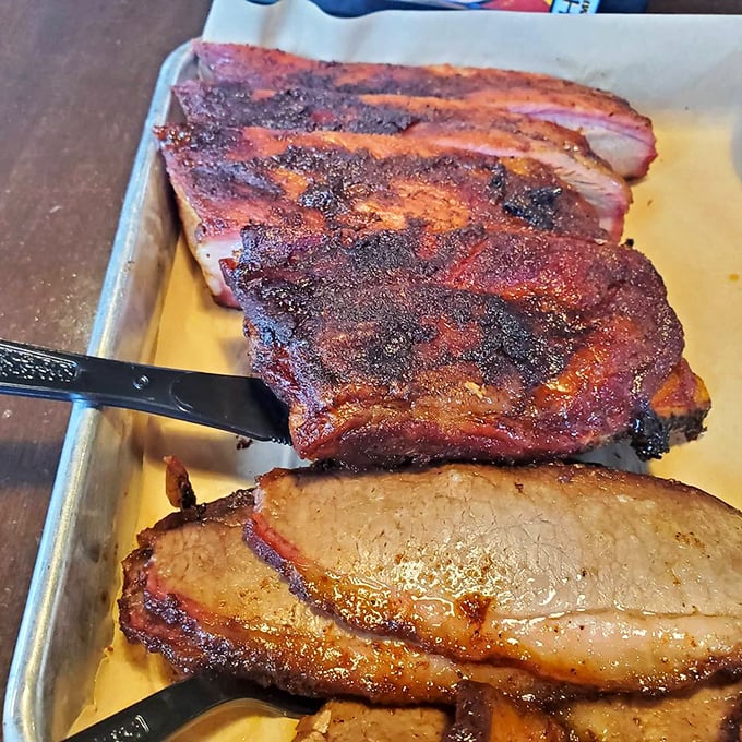 These ribs and brisket weren't just smoked, they were gently coaxed into barbecue perfection through patience and fire.