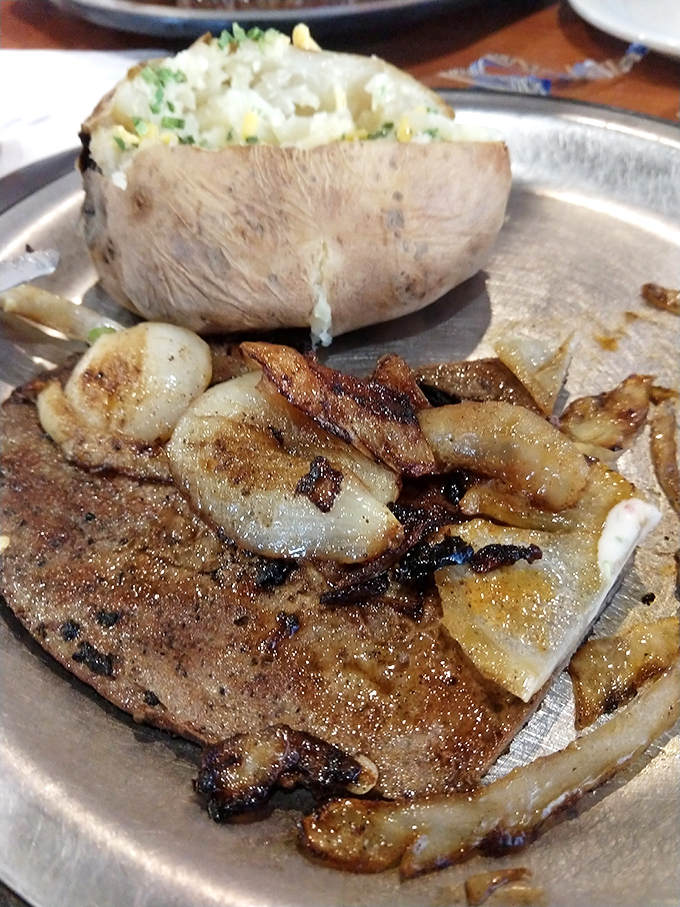 Steak and mashed potatoes: the dynamic duo of comfort food. This plate looks like it could hug your taste buds and tuck them in for a nap.