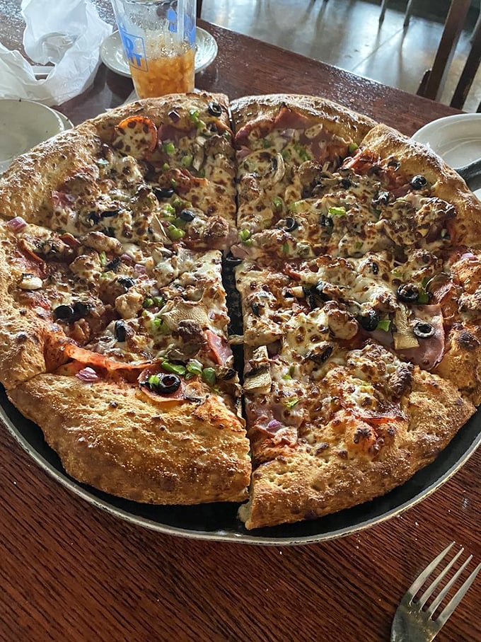 "The Heap" lives up to its name. It's a mountain of toppings that would make even the most seasoned Everest climber pause in awe.