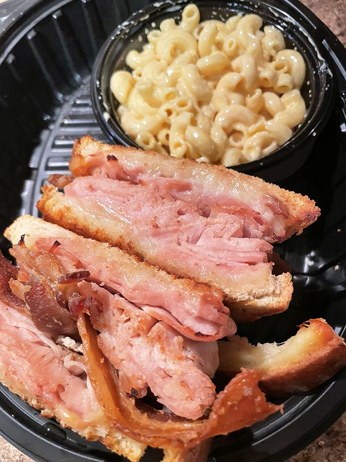 The ultimate comfort food combo &ndash; a hearty sandwich with a side of mac and cheese that's basically sunshine in a bowl.