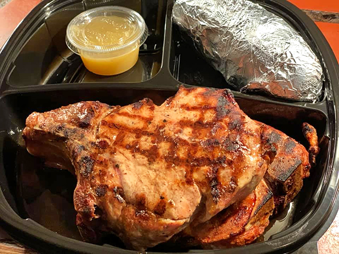 This pork chop, draped with caramelized onions, isn't just dinner&mdash;it's edible architecture built on a foundation of savory perfection.