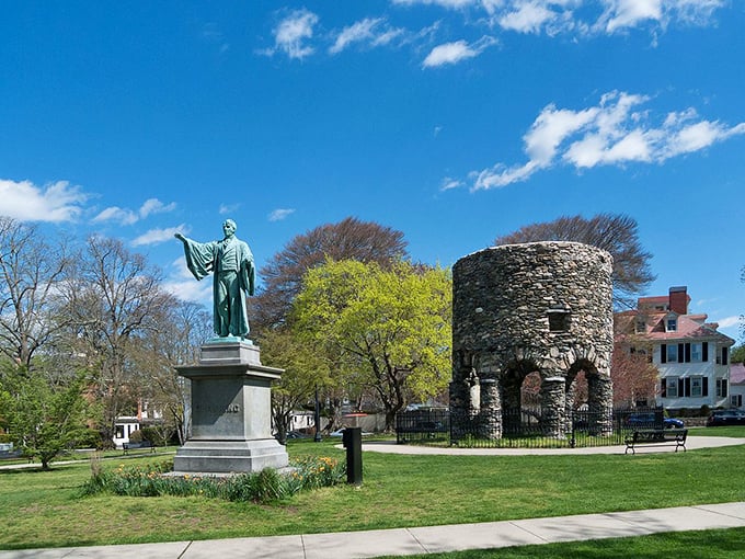 "Giving directions in style since 1880." The William Ellery Channing statue points the way, though whether to enlightenment or the nearest coffee shop remains unclear.