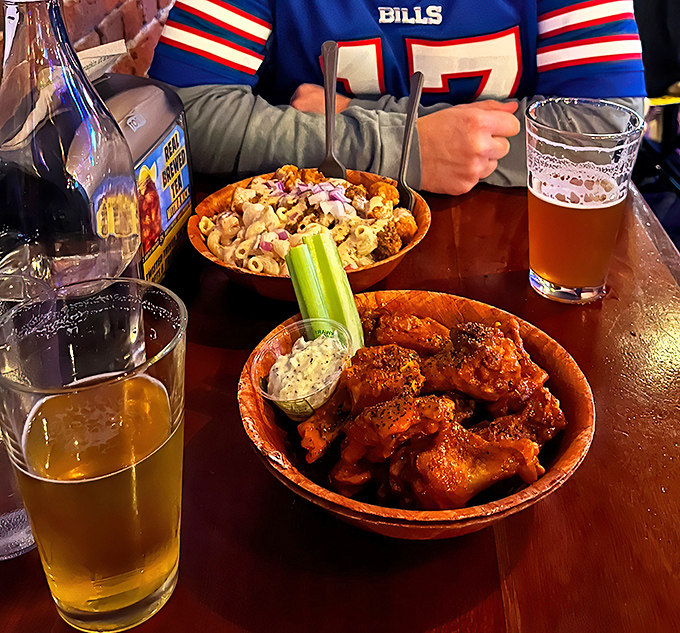 A match made in heaven: crispy wings and cold beer. It's like peanut butter and jelly, but for grown-ups.
