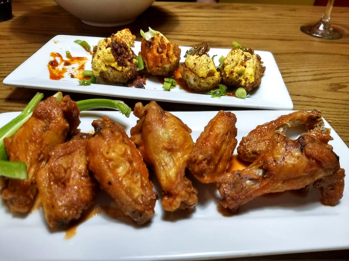 The perfect wing platter arrives with both sauce-tossed beauties and what appears to be their dry-rubbed cousins. A diplomatic solution to family dinner debates.