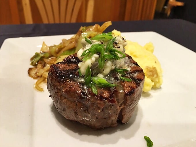 AJ's Tenderloin Filet: Where beef meets poetry. Perched atop a cloud of mashed potatoes, it's a tower of flavor that would make the Eiffel Tower jealous.