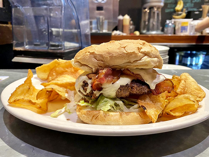 The All American Burger: A patriotic pile of perfection that would make Uncle Sam salute with his free hand while eating with the other.