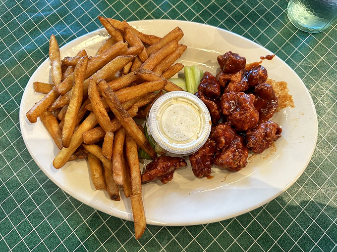 BBQ wings and fries: a classic combo that never goes out of style, like your favorite pair of comfy jeans.