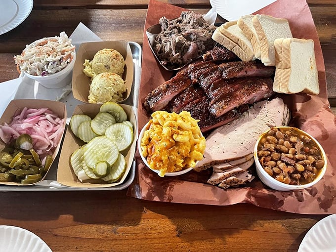 A barbecue spread that would make a vegetarian weep&mdash;meats in perfect formation, flanked by colorful sides like loyal soldiers.