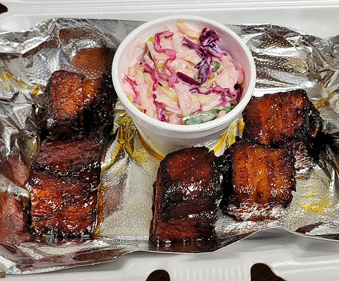 BBQ perfection meets Southern charm. These ribs are so tender, they practically fall off the bone with a stern look.