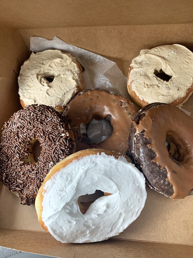 A box of joy! These assorted donuts are like the Avengers of the pastry world &ndash; each with its own superpower of deliciousness.
