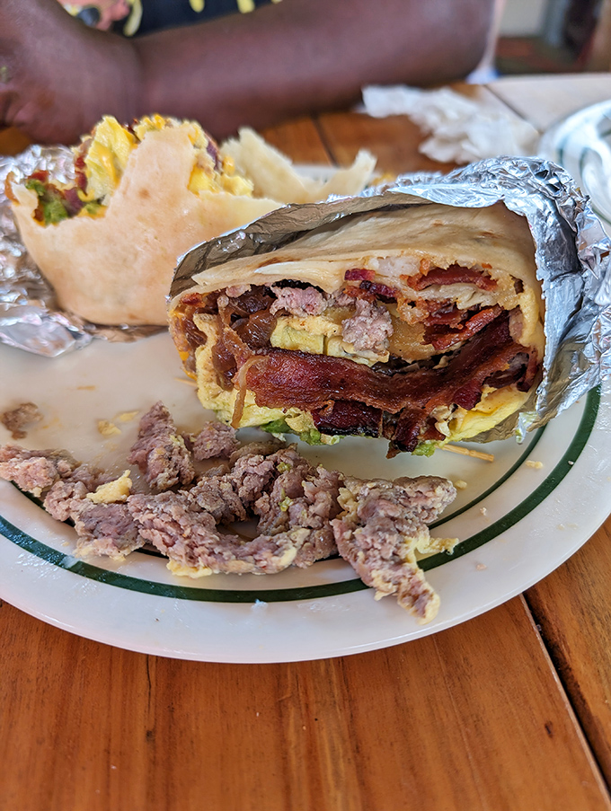 Behold, the breakfast burrito in its natural habitat! This foil-wrapped wonder is like a warm hug for your insides.