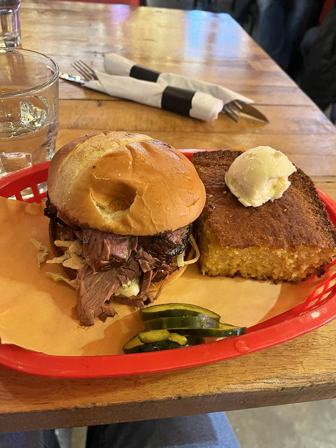 The brisket sandwich &ndash; where slow-cooked beef meets toasted brioche in a relationship supported by pickles and cornbread.