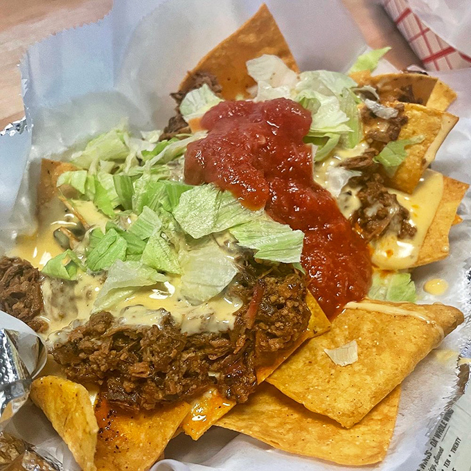 Brisket nachos: Because sometimes you need your chips to wear a tuxedo of smoky, cheesy, beefy goodness.