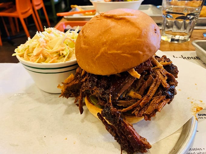 The Leaning Tower of Brisket &ndash; a sandwich so packed with juicy, smoky goodness, it defies both gravity and willpower.