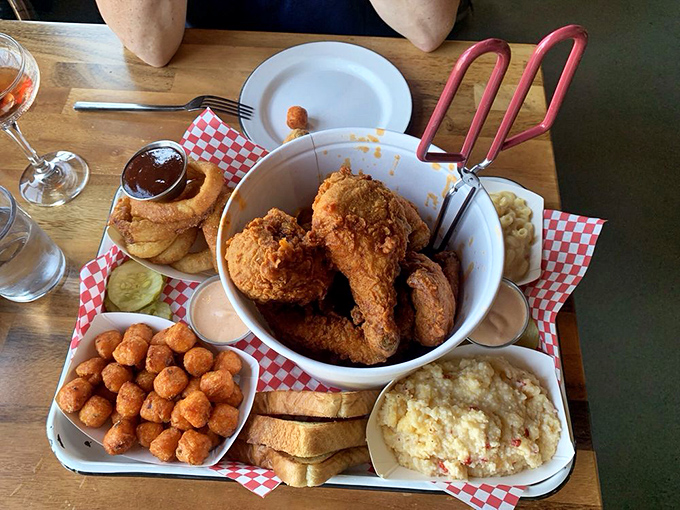 The Blue Plate special: where fried chicken meets its perfect companions. Those sweet potato tots are the unsung heroes of this platter.