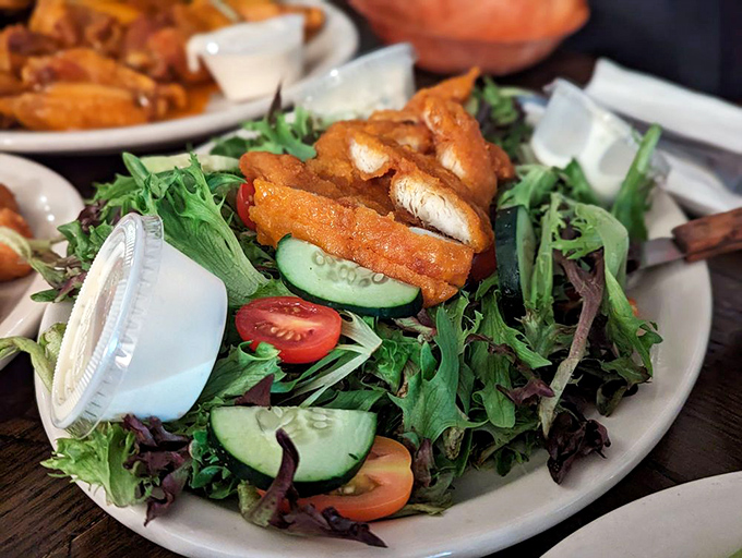 For those pretending to be virtuous, the Buffalo Chicken Salad offers the perfect alibi: "I had a salad for lunch!"