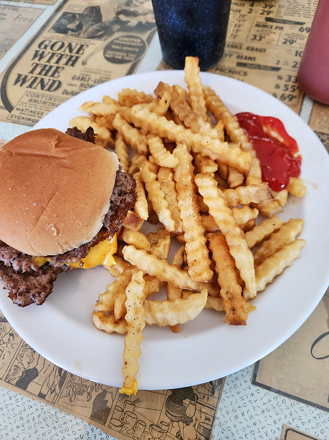 A burger that doesn't need a fancy name or artisanal pretense, just crinkle-cut fries and the kind of bun that knows its supporting role.