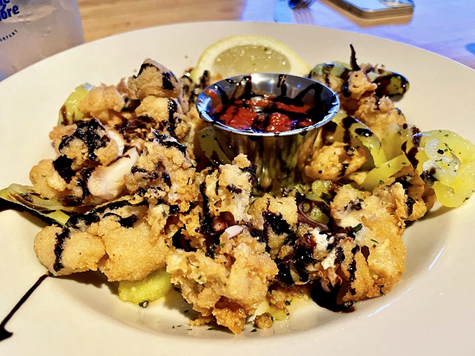Calamari that could convert even the most tentacle-averse. Crispy, tender, and begging to be dunked in that tantalizing sauce.
