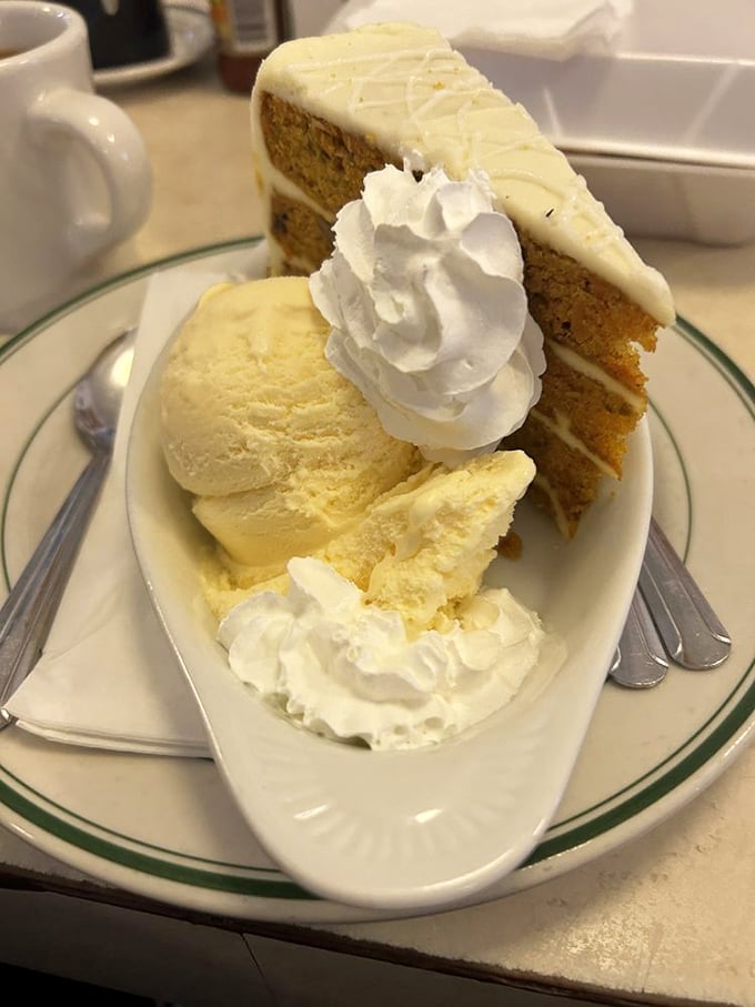 Carrot cake &agrave; la mode: where vegetable consumption meets pure indulgence. That cream cheese frosting could make even the most hardened food critic weep with joy.