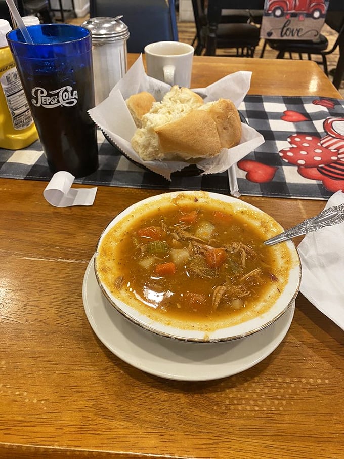 A bowl of chicken veggie soup that could cure anything from a cold to a bad day. Grandma, is that you?