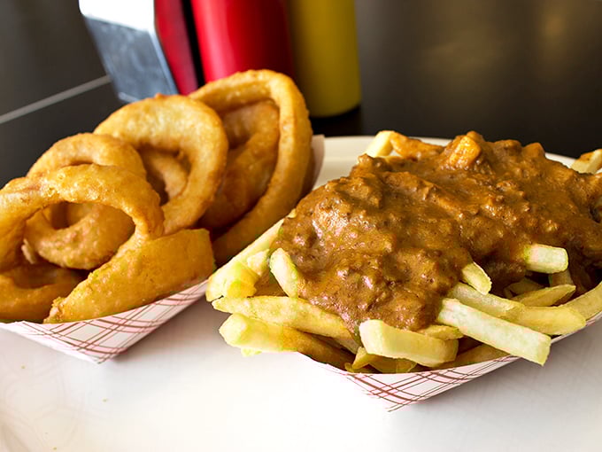 Comfort food royalty! These chili fries and onion rings are like a warm hug for your taste buds.