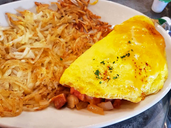 This omelet is playing hide and seek with veggies, but the real winner? Your taste buds when they find that chorizo treasure.