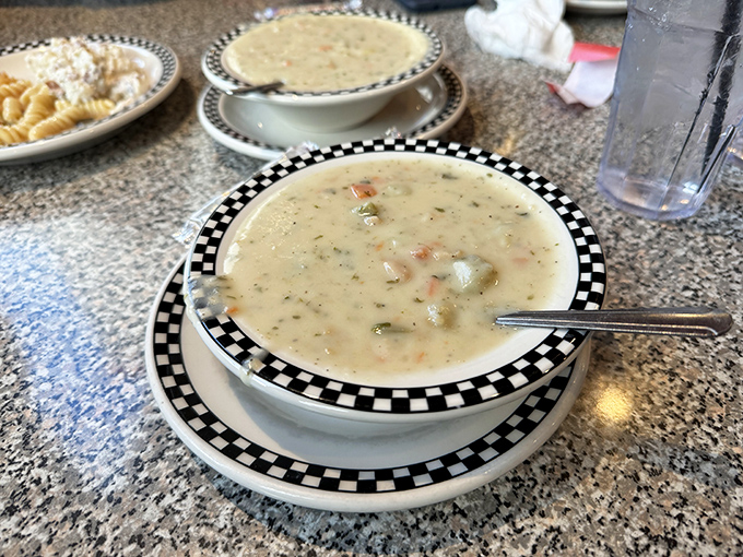 A bowl of warmth and happiness. This clam chowder looks thick enough to stand a spoon in &ndash; New England, eat your heart out!