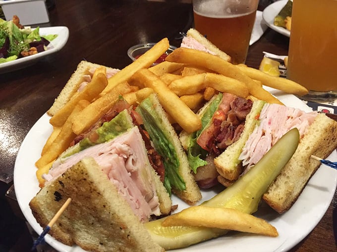 This club sandwich isn't just stacked, it's a skyscraper of deliciousness. Empire State Building, meet your tasty rival!