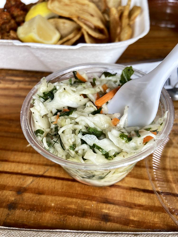 This isn't your grandma's coleslaw (unless your grandma was a culinary genius). Fresh, crunchy, and the perfect sidekick to your seafood feast.