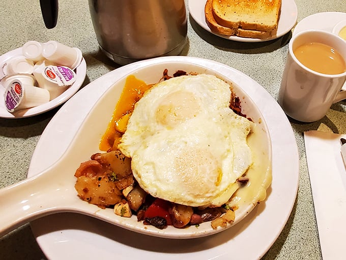 The Country Skillet: where potatoes go to fulfill their crispy, golden dreams. Paired with coffee, it's the breakfast of champions (and regular folks too).