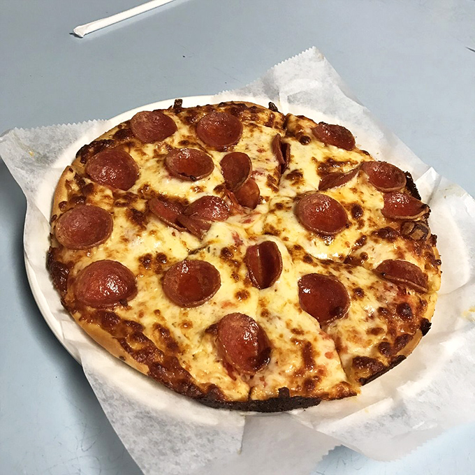 Double the cheese, double the fun! This pepperoni-studded masterpiece is what cheesy dreams are made of.