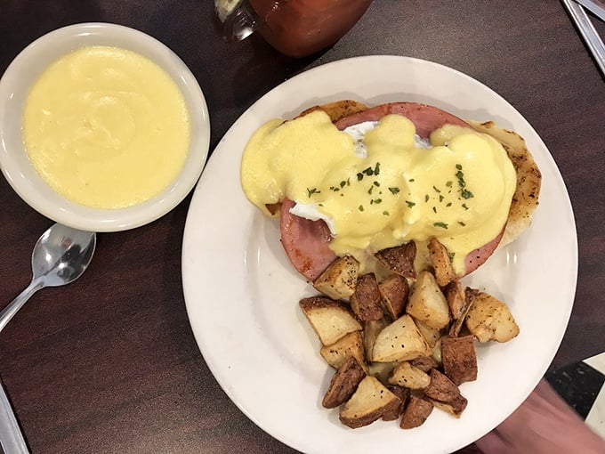Eggs Benedict: Where breakfast meets black tie. This hollandaise sauce is smoother than Dean Martin on a Saturday night.