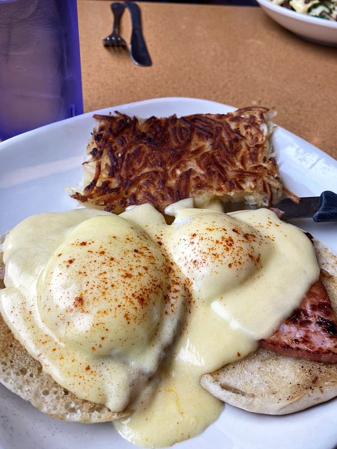 Eggs Benedict: Where breakfast meets black tie. This dish is dressed to impress and ready to crash your taste buds' party.