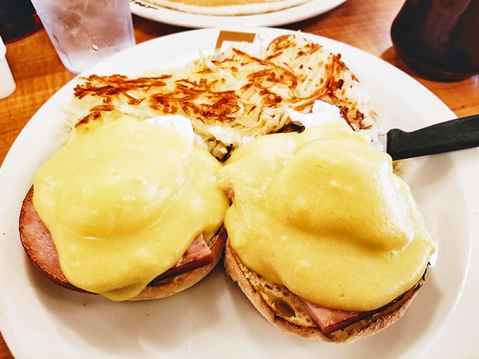 Eggs Benedict: where breakfast gets dressed up for the day. These golden orbs perched atop their English muffin thrones are royally delicious.