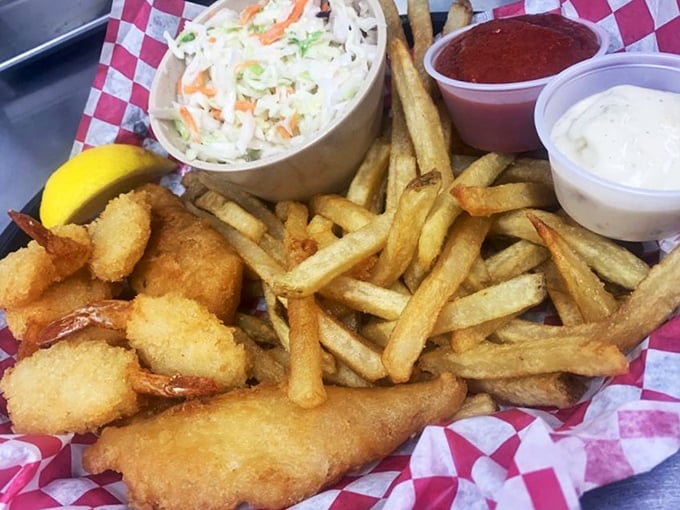 This isn't just any fish fry&mdash;it's a golden-crusted revelation with crispy fries, creamy slaw, and dipping sauces for every mood.